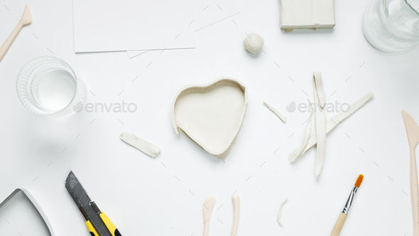 Hobby modeling from clay, tools and accessories for crafting on white ...