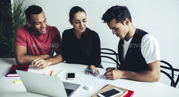 successful group of intelligent people collaborating indoors Stock ...