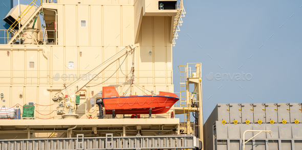 lifeboat on cargo container ship. Safety lifeboat is one of the most ...