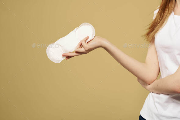 Woman with pad in hand menstruation critical days clean appearance ...