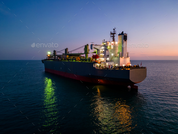 A massive cargo ship wood chips carrier in the sea, aerial view Stock ...