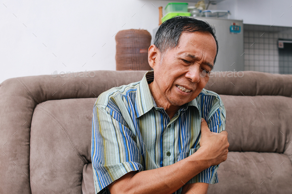 Old Man Suffer From Arm Pain Stock Photo by Garakta-Studio | PhotoDune
