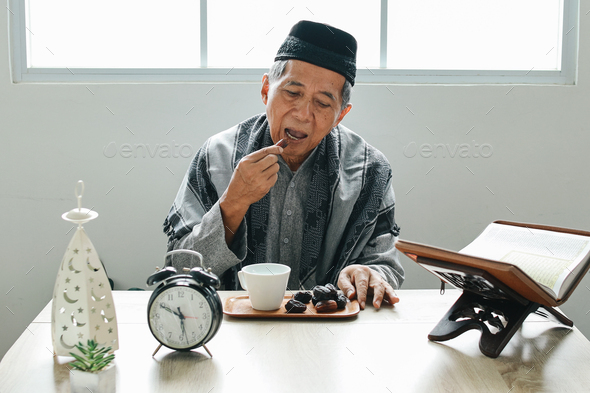 Senior Muslim Man Eating Dates Fruit on Iftar Ramadan Stock Photo by ...