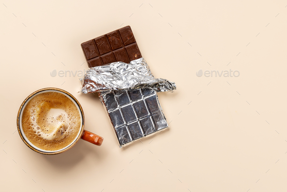 Coffee break bliss: Chocolate bar paired with a cup of coffee Stock ...