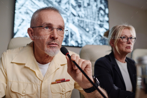 Military man speaking at conference Stock Photo by AnnaStills | PhotoDune
