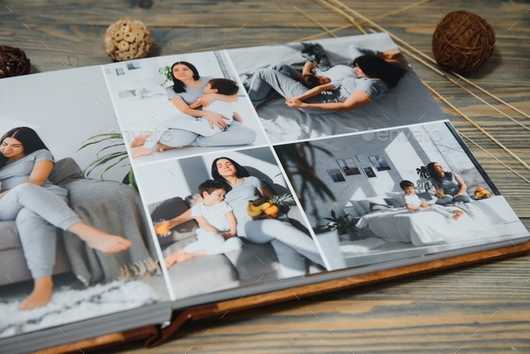 Luxury wooden photo book on natural background. Family memories ...