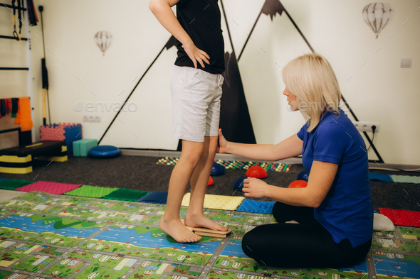 Kid on Sensory Mat Massage during sensory integration session. child ...