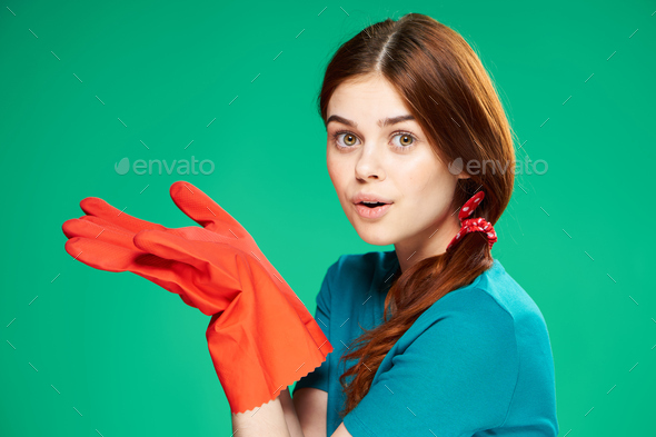 Cheerful Red Haired Woman Wearing Rubber Gloves House Cleaning