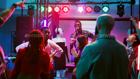 Crowd of friends having fun at party Stock Photo by DC_Studio | PhotoDune