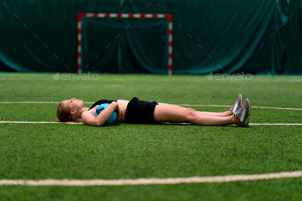 Womens Soccer Tired Female Soccer Player Lying Resting On Green