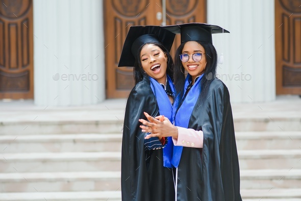 Happy two international students. Graduation Student Stock Photo by ...