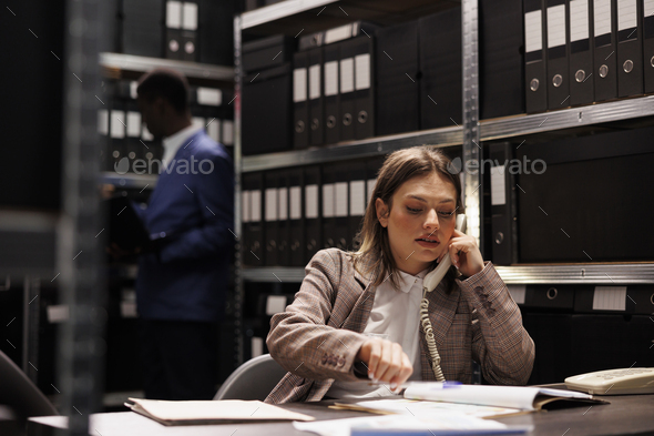 Police officer using landline phone Stock Photo by DC_Studio | PhotoDune