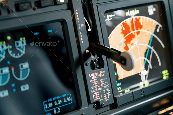 A detailed shot of the radar control and navigation panel in the ...