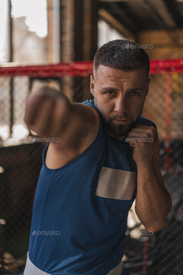 Close up of a boxer's fist in gym punch Stock Photo by guyswhoshoot