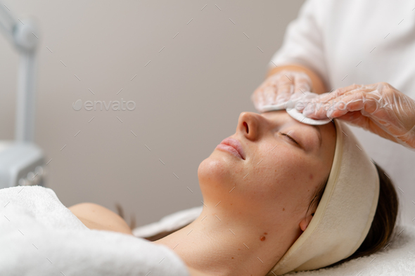 cosmetic procedure to rejuvenate the skin of the face patient in a ...