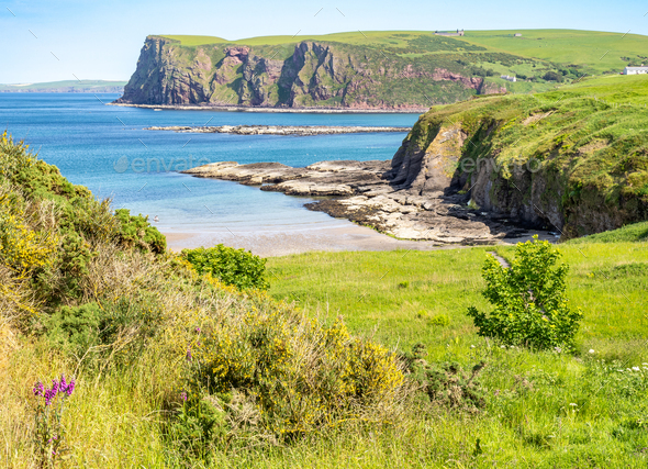 Cullykhan Bay and Fort Fiddes in Scotland Stock Photo by estivillml