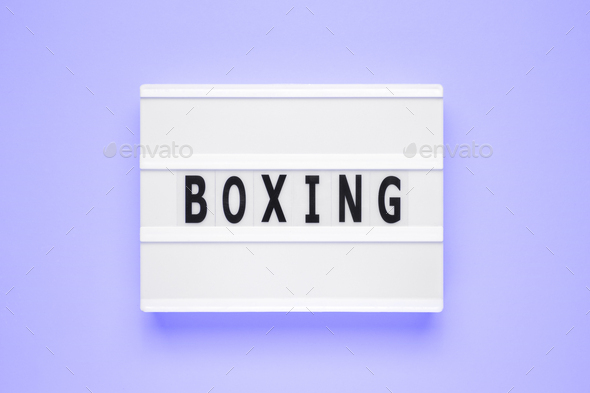 The word boxing on lightbox isolated blue background. Stock Photo by ...