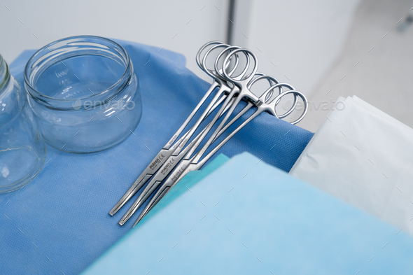sterile surgical instruments lie on the table operation in operating ...