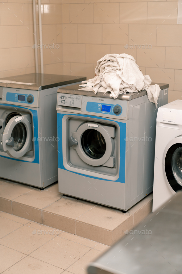 industrial washing machine Hotel laundry services Clothes dryer concept ...