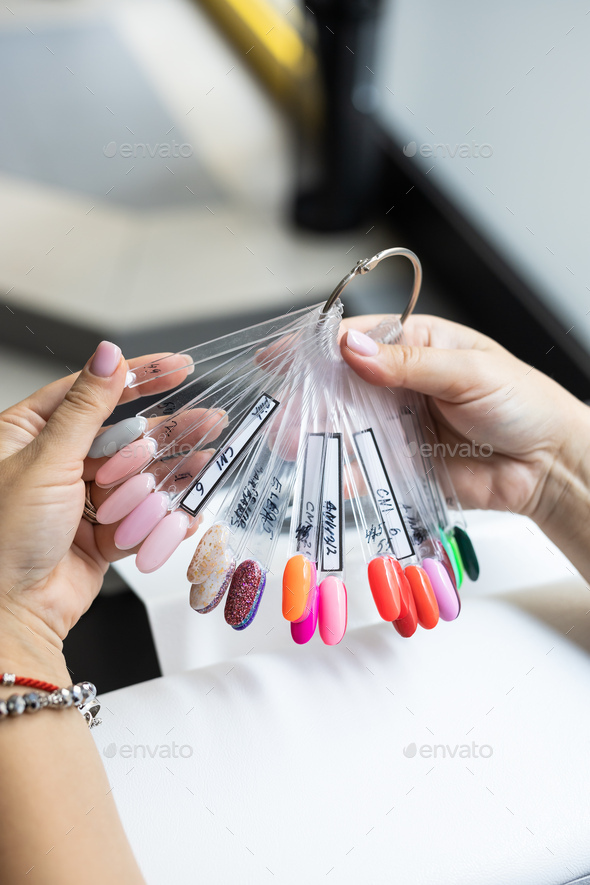 Collection of nails color polish samples. A palette of nail designs of ...