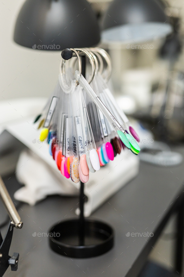 Collection of nails color polish samples. A palette of nail designs of ...