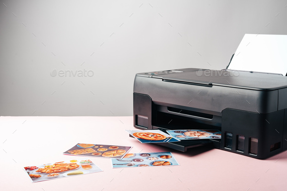 Modern laser printer printing color photos of food close up Stock Photo ...