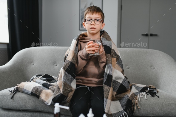 Sad little boy suffering from cold Stock Photo by sedrik2007 | PhotoDune