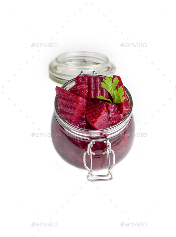 Sliced red beets in a jar - preparation of fermented. Pickled beetroot ...
