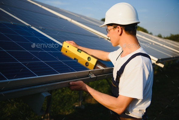 Renewable energy and solar power concept, worker or Electrical ...