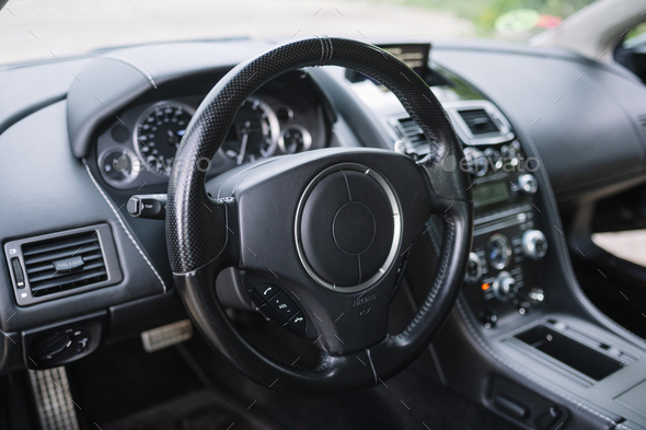 Interior of a sports car. Stock Photo by karrastock | PhotoDune