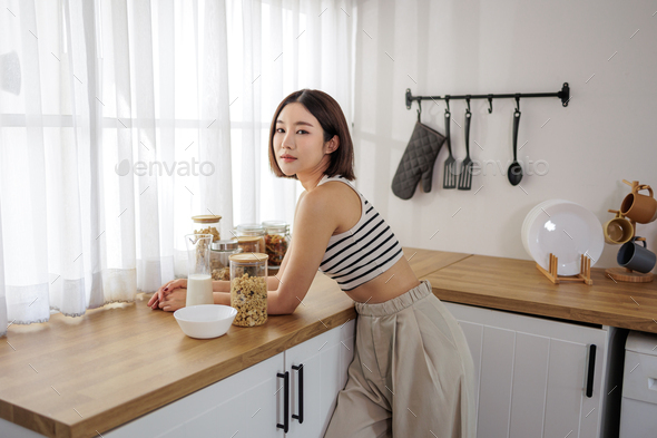 Healthy Morning Routine, Asian Woman with Cereal and Milk Stock Photo ...
