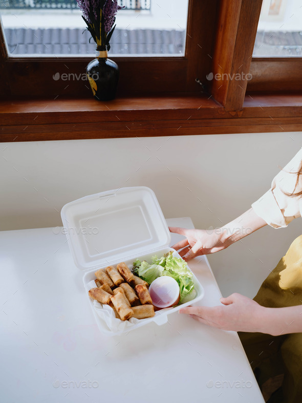 Food from delivery on the table in plastic utensils, a fast food ...