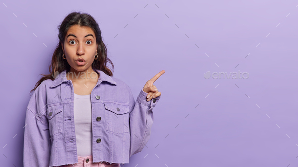 Horizontal shot of brunette young Iranian woman in fashionable attire ...