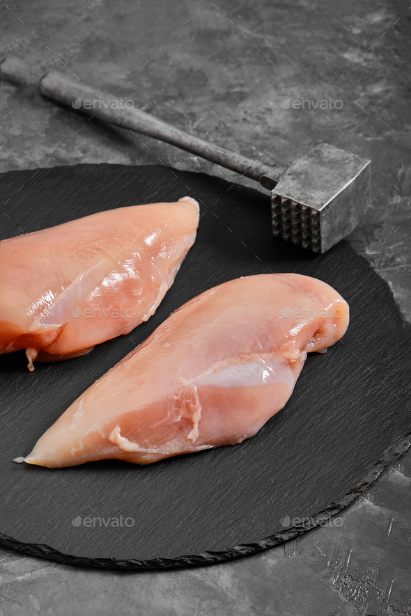 Chicken breasts, raw chicken fillet Photo for a store with natural ...