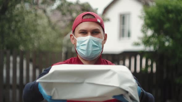 Delivery Concept Portrait of Happy Spanish Delivery Man with Face Mask ...