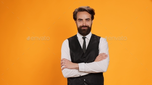 Elegant waiter poses with reliability Stock Photo by DC_Studio | PhotoDune