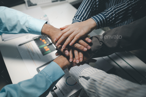 Group with hands together, teamwork, collaboration and unity between ...