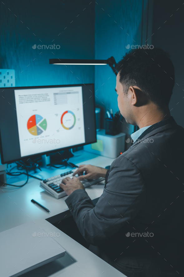 using computer together in office, successful business people working ...