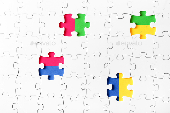 Assembled puzzles with color inserts inside top view Stock Photo by DS ...