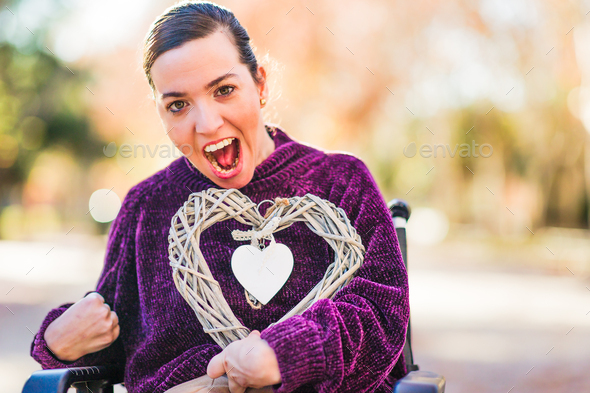 InspireInclusion heart shape, love valentine gesture. Young woman with ...