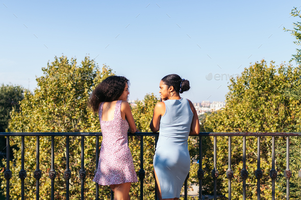 Back view of two girlfriends on a bridge Stock Photo by pedrom97 ...