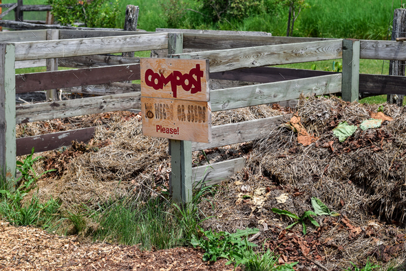 Outdoor 3 bin compost system in a garden Stock Photo by JulieAlexK