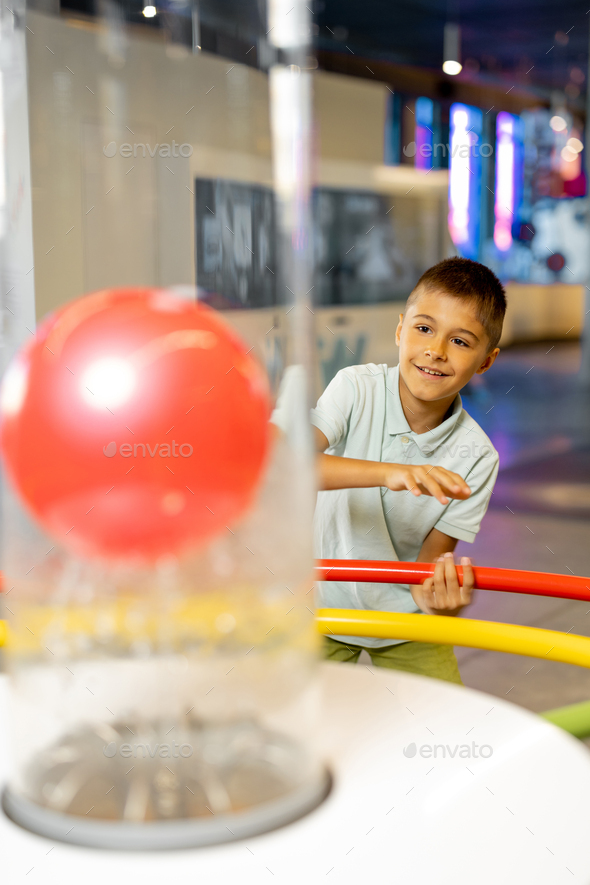 Little boy visits a science museum Stock Photo by RossHelen | PhotoDune
