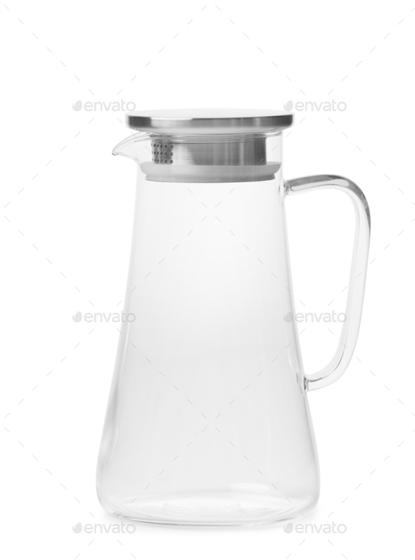 Empty glass jug for milk and drinks with a stainless steel lid on a ...