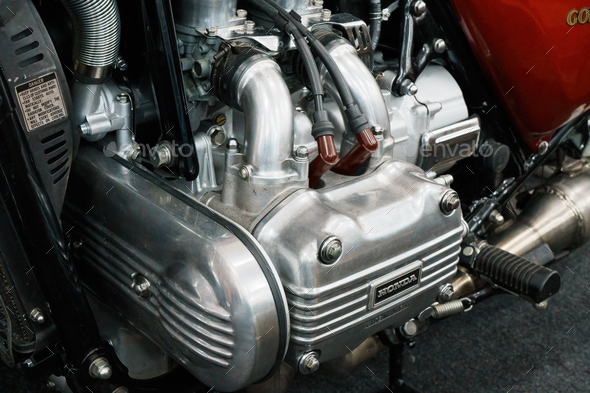 Closeup shot of details on a metallic Honda Goldwing GL1000 engine ...