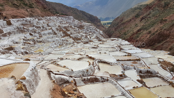 an aerial view of salt pans on the mountainside: Salineras de Maras in ...
