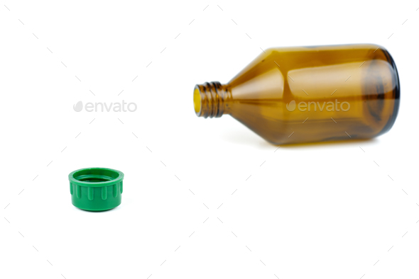 Brown glass bottle isolated on white background. Focus point - bottle ...