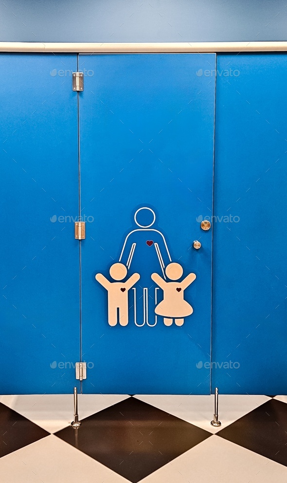 Shared family bright restroom in airport, mall. Unisex WC for mom, dad ...