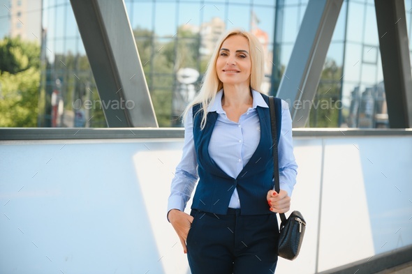Beautiful Woman Going To Work, Business Woman Walking Near Office ...