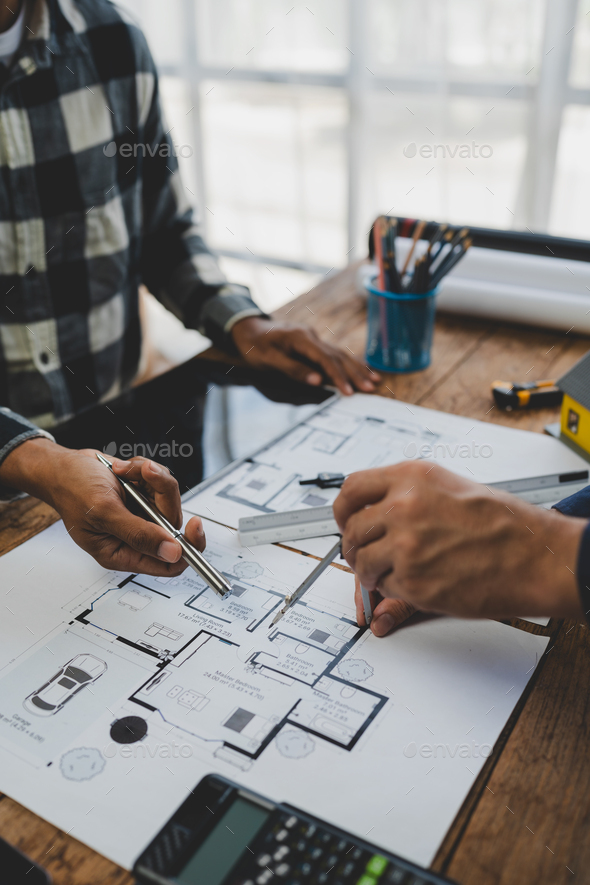 Structural engineer team discussing and calculating work Office design ...